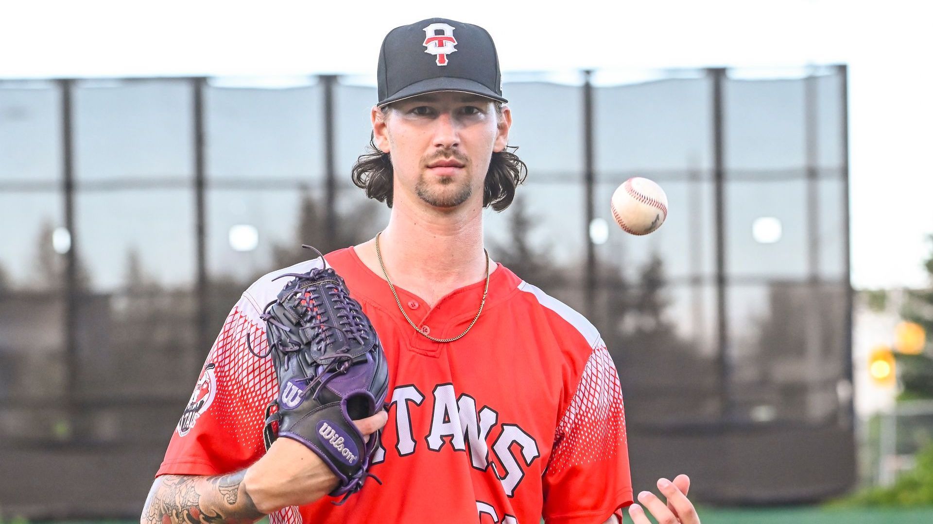 Larson expressing his heritage through ink, baseball
