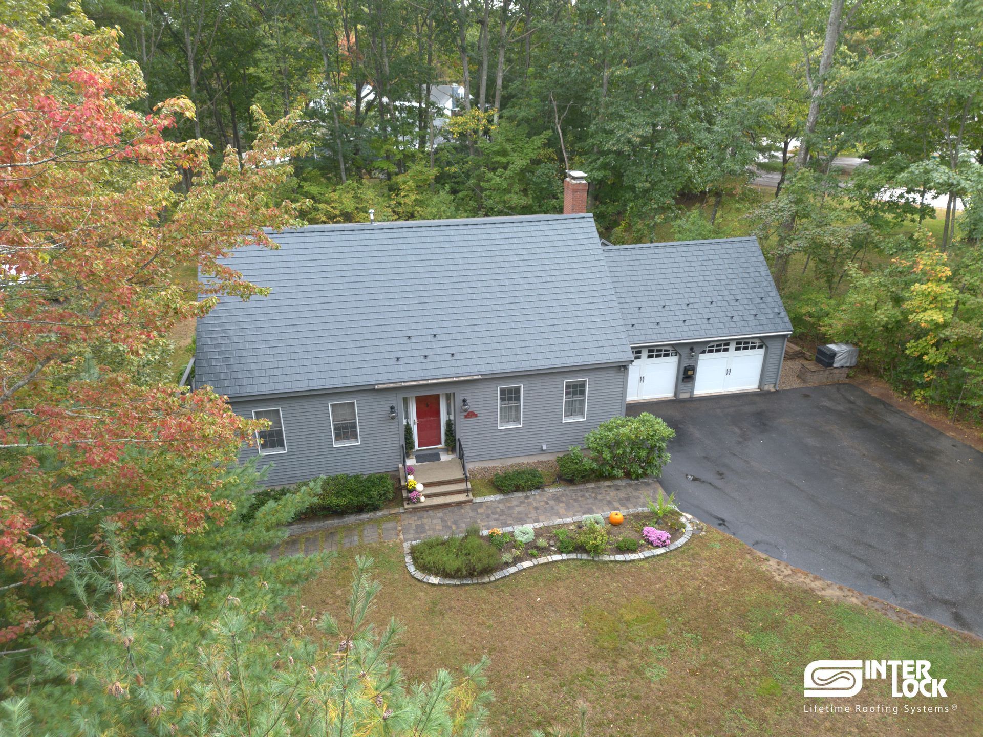 Black Interlock Metal Slate Roofing System Installed on Rochester, NH Home