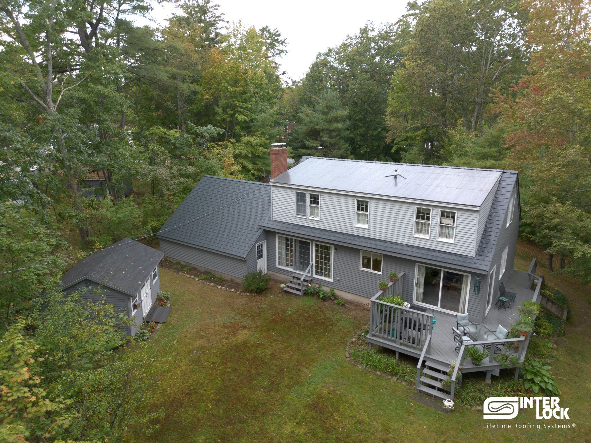 Black Interlock Metal Slate Roofing System Installed on Rochester, NH Home