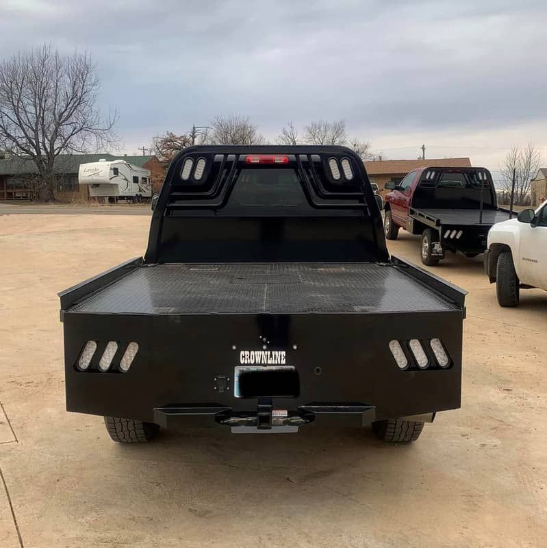 Photos of hay beds, service beds, and flatbed installs