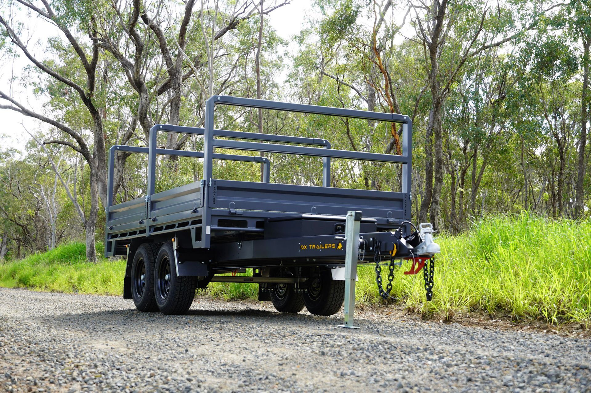 The Ox Pro Series Flat Top Trailer with a drawbar toolbox and ladder ...