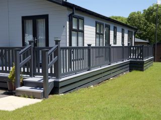 Residential park homes decking, Twin unit decking, roughcast home decking