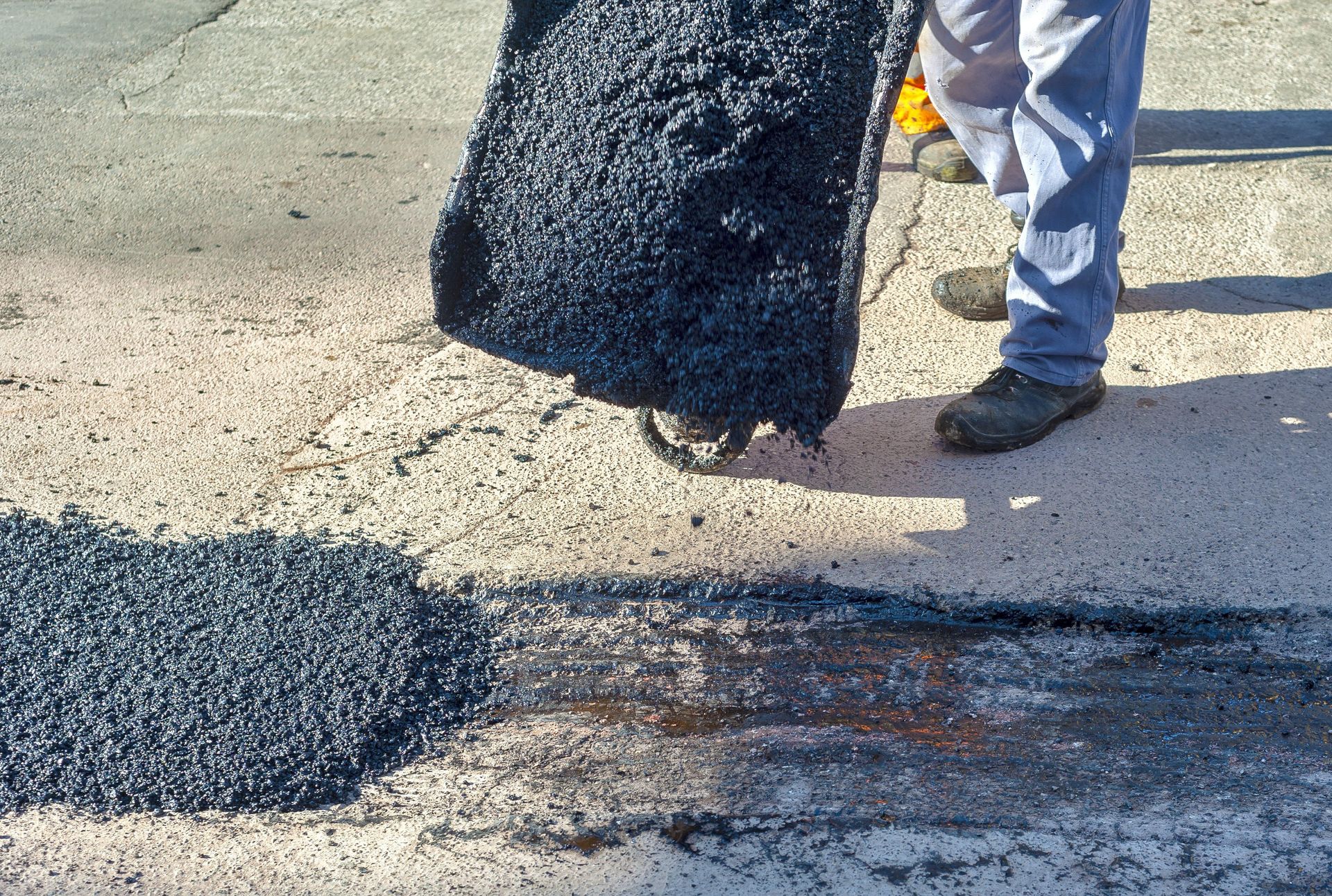 Defects in asphalt driveways- causes and repair