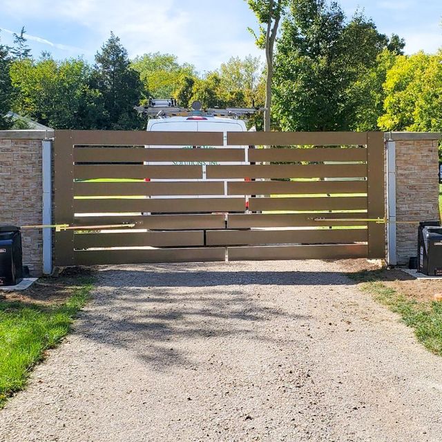 Large Residential Gates A Large Gate Riveted To The Old Wrought Iron