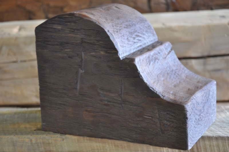 Hand hewn wood mantels, floating shelves, corbels, and box covers.