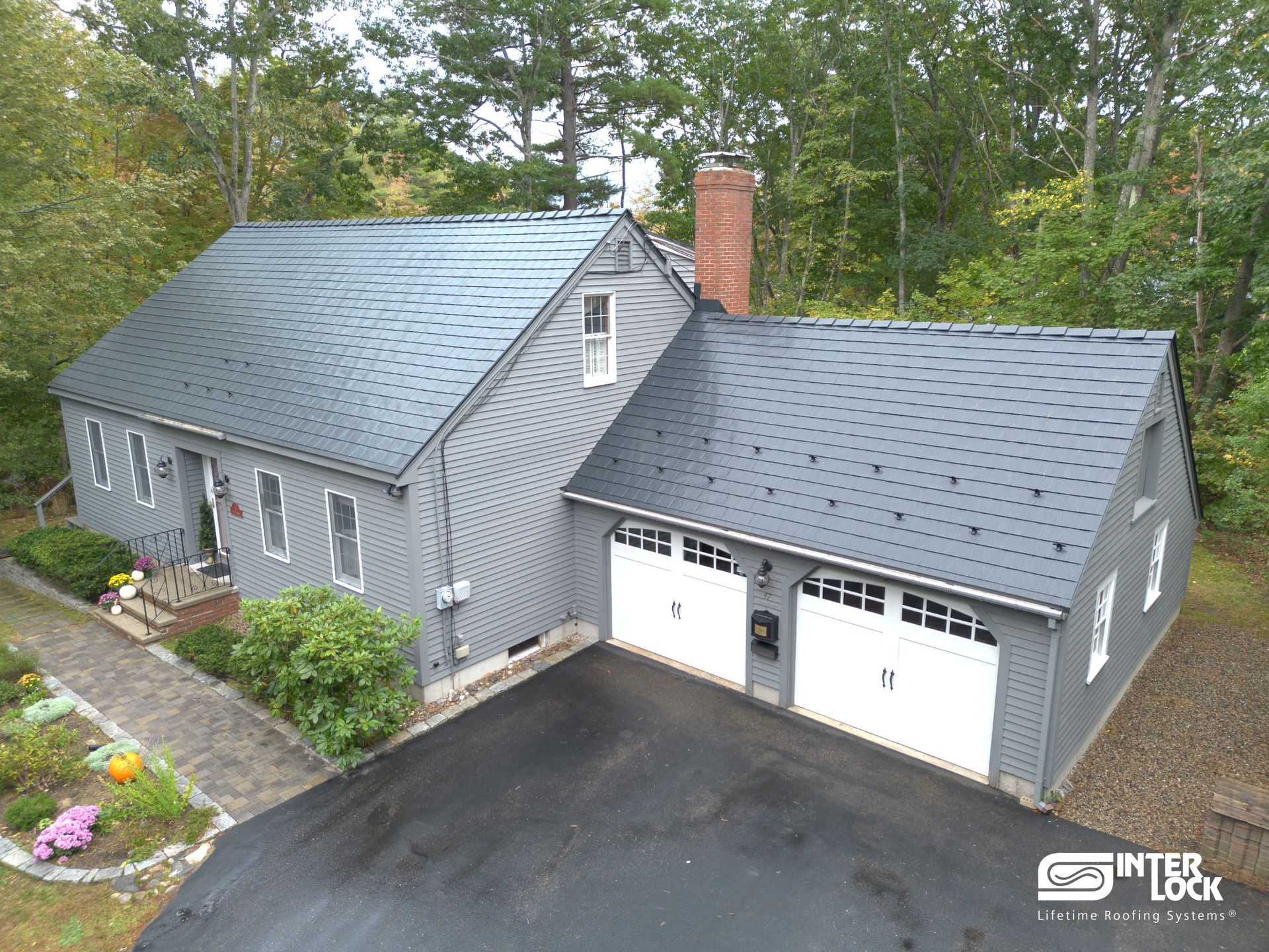 Black Interlock Metal Slate Roofing System Installed on Rochester, NH Home