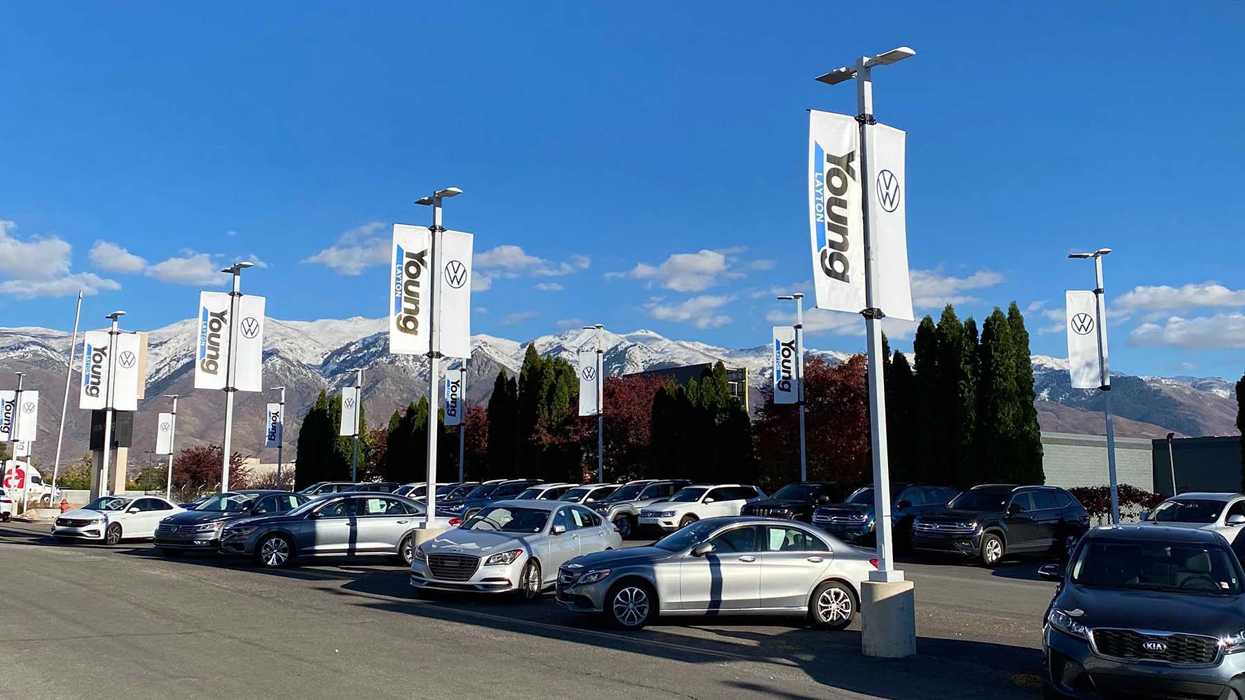 Stand Out with Vibrant Car Dealership Flags & Banners