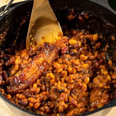 Dutch Oven Smoked Pit Beans Recipe & Video | Cowboy Charcoal