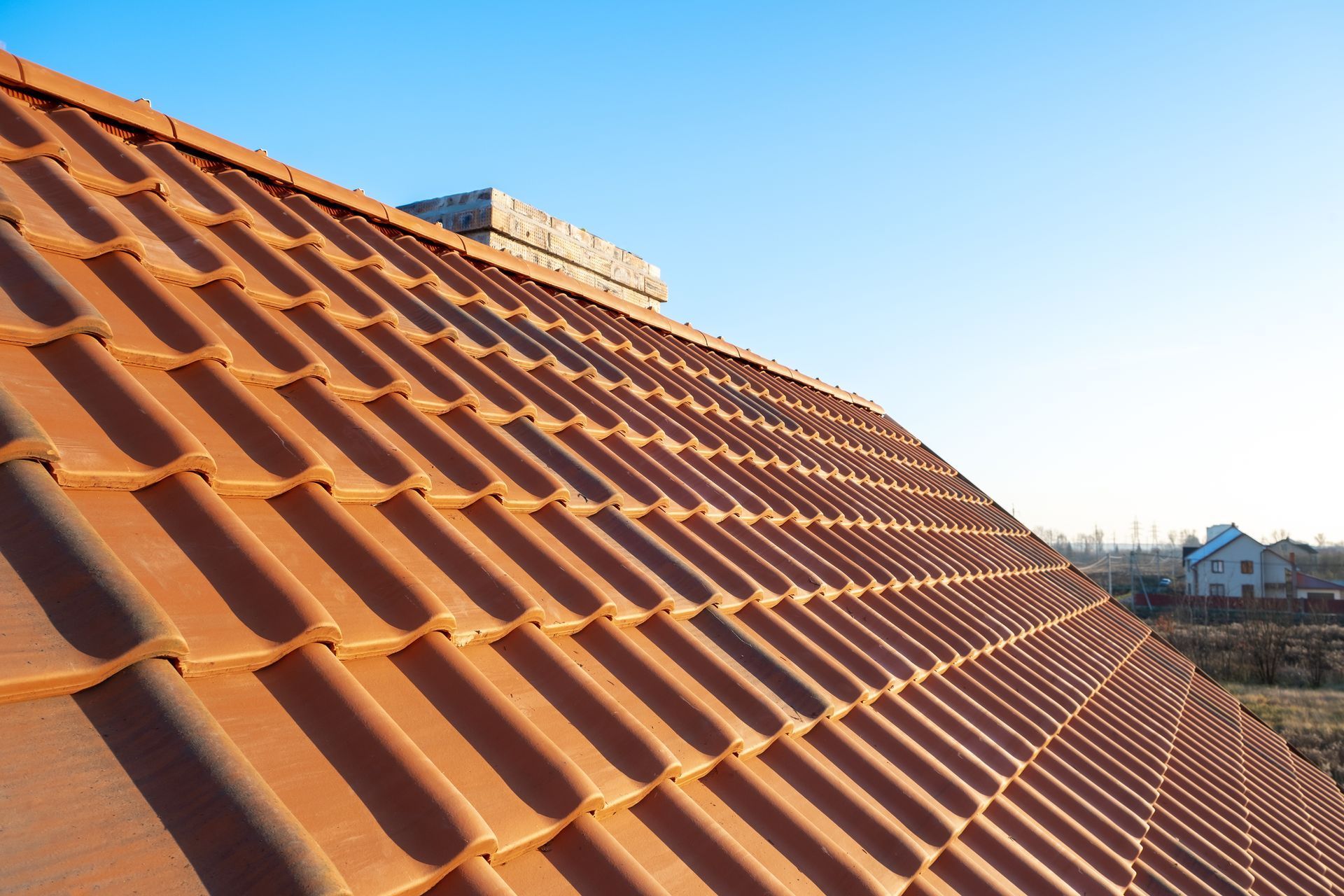 Understanding the Benefits of Sloped Roofing