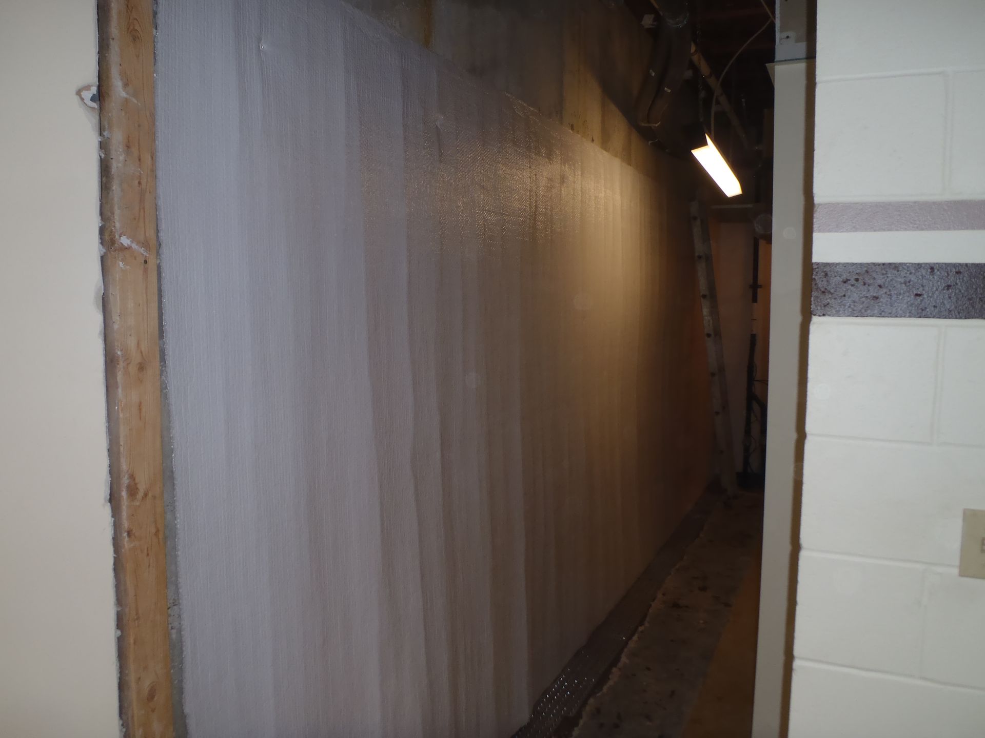 The Role of Internal Drainage Systems in Protecting Your Basement