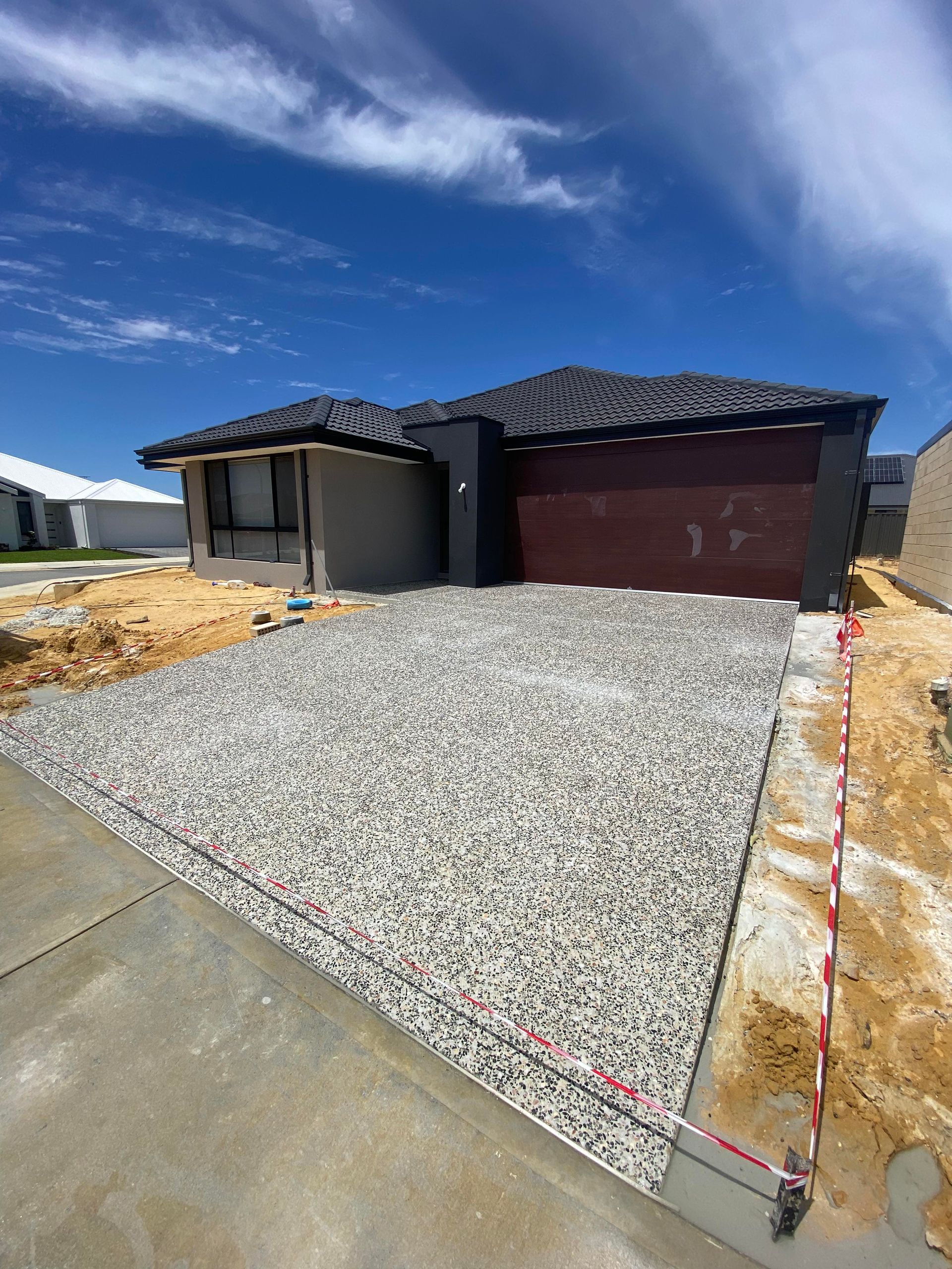 Exposed Aggregate Driveways: Enhancing Your Home’s Aesthetics