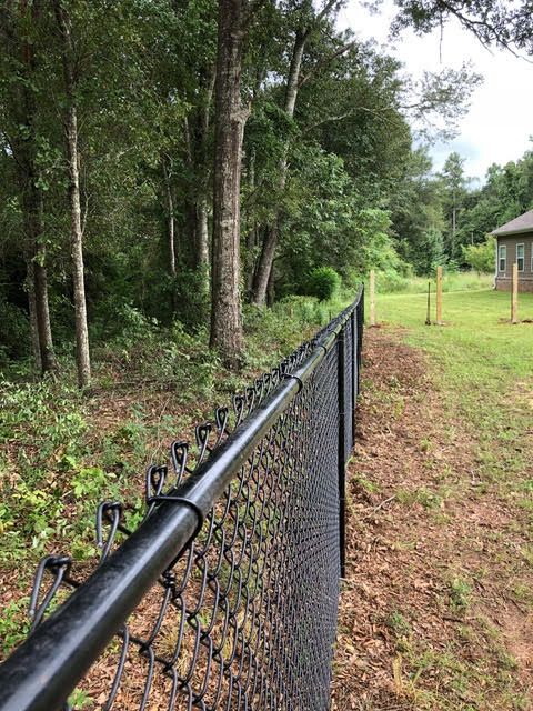 Galvanized/black chain link Installation | Byron Fence