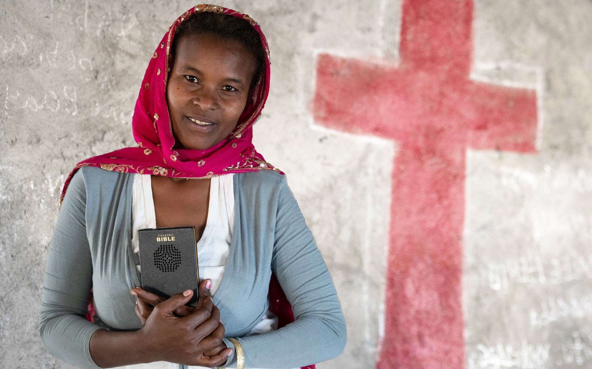 Opse Bdane wants to draw others to Christ even if she can't read