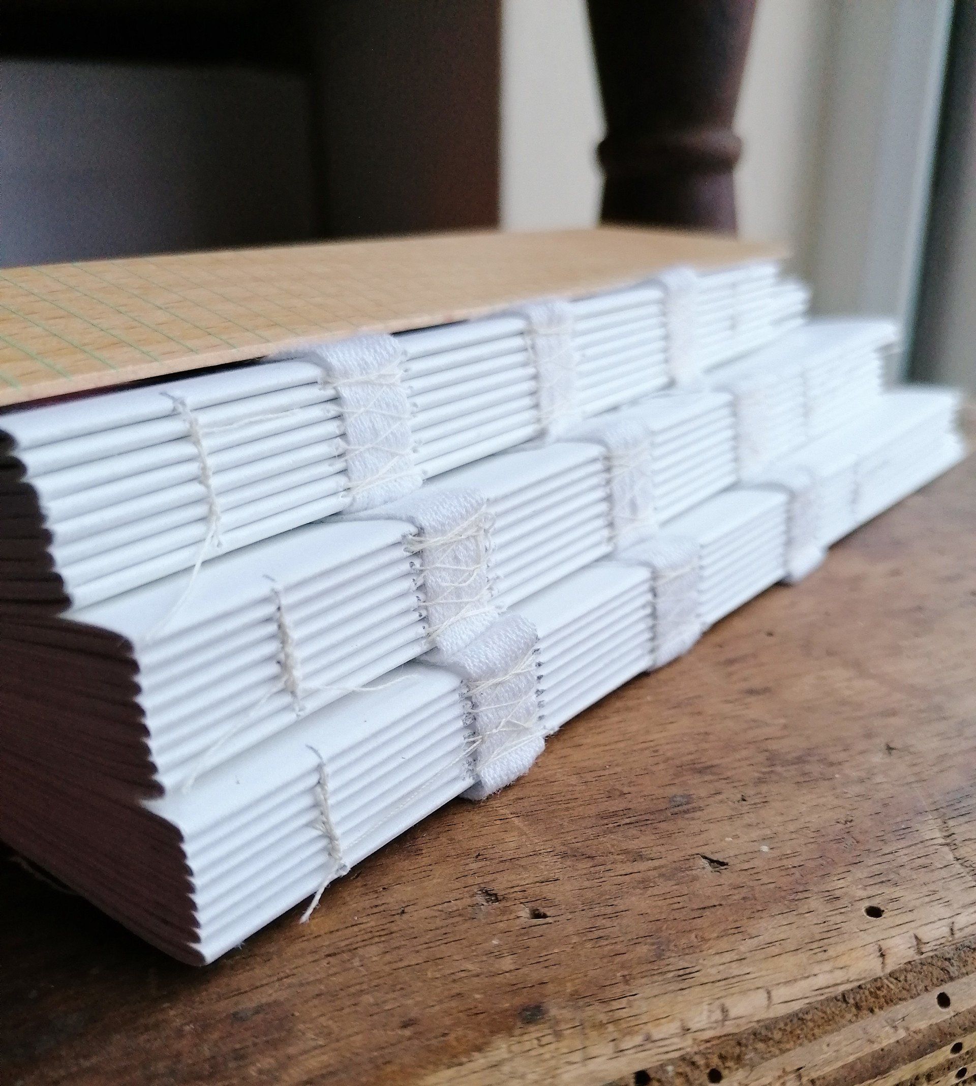 Custom hand bound books with vintage style & sustainability.