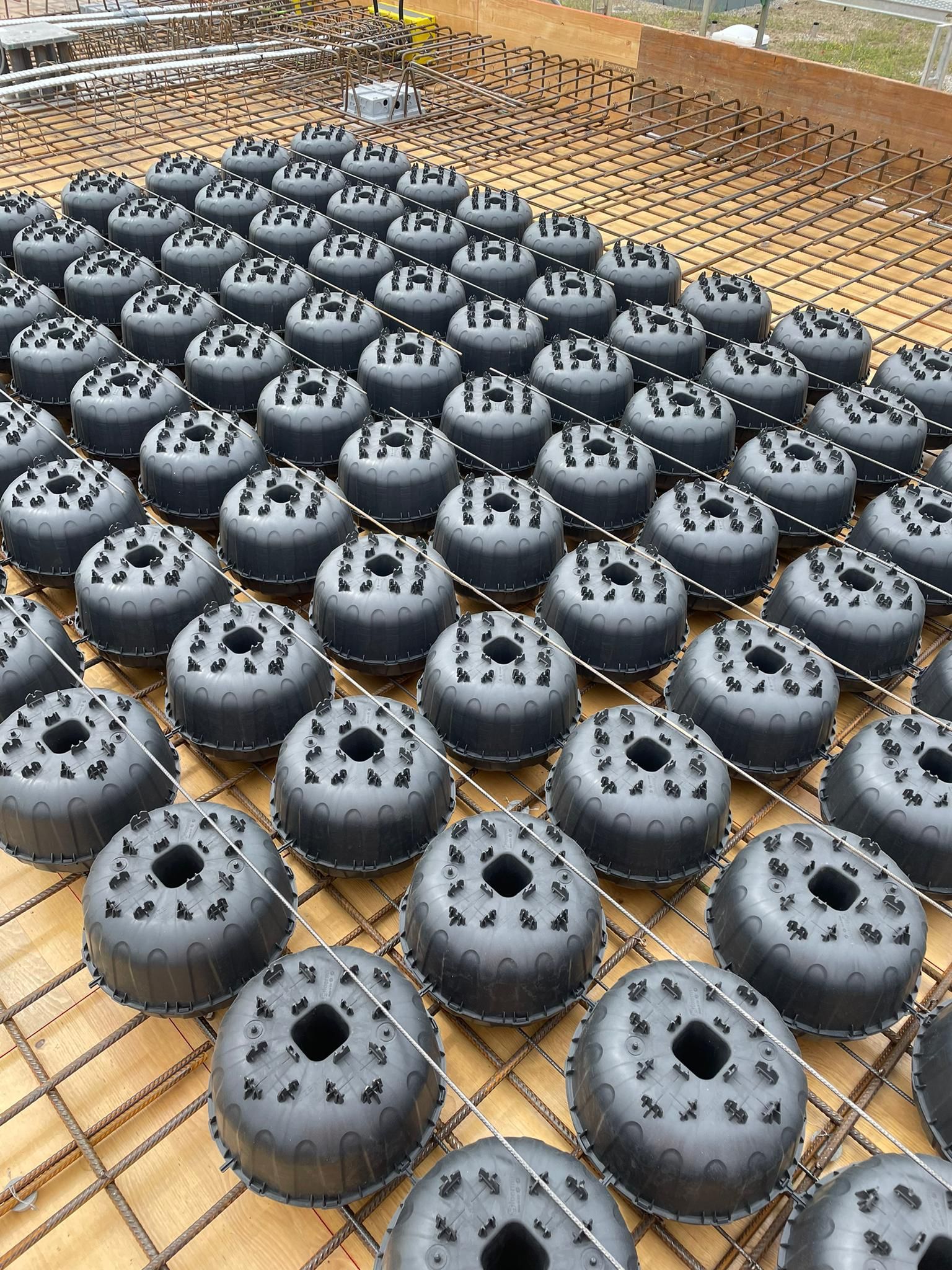 Biaxial voided slabs