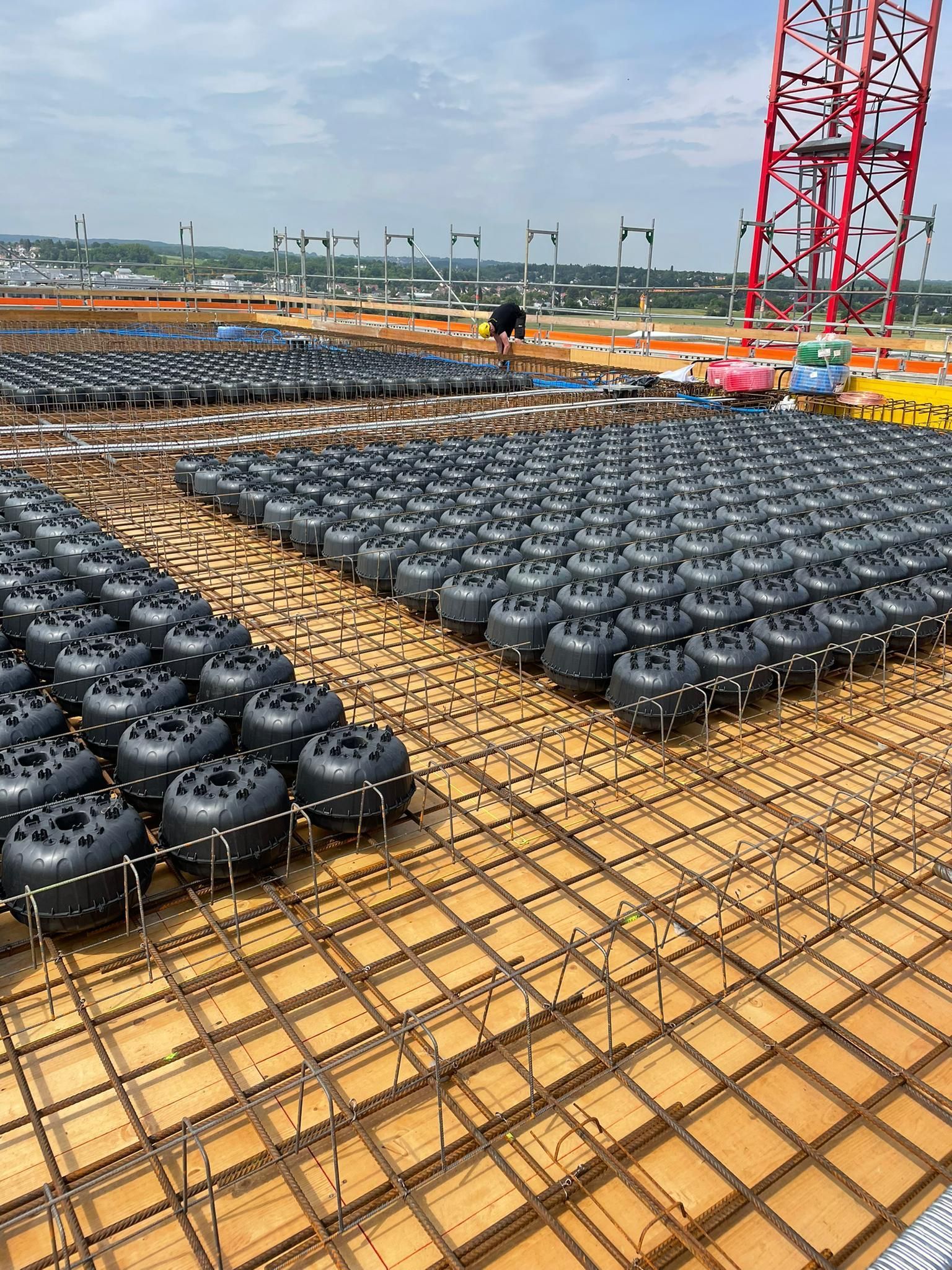 Biaxial voided slabs