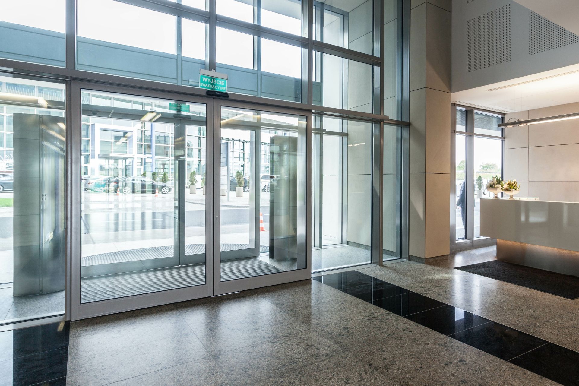 Sliding vs. Revolving Doors: Which Is Right for My Building?