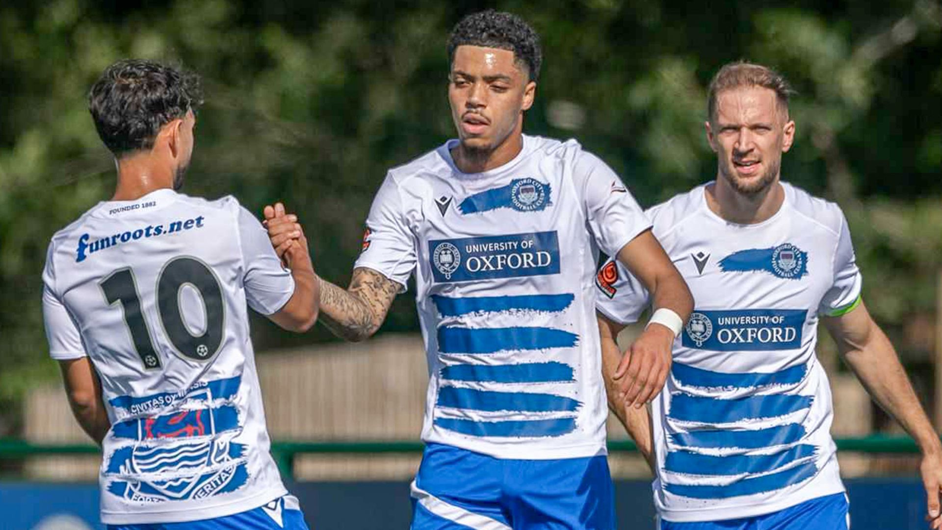 Four Goal Walsh Sends City Through