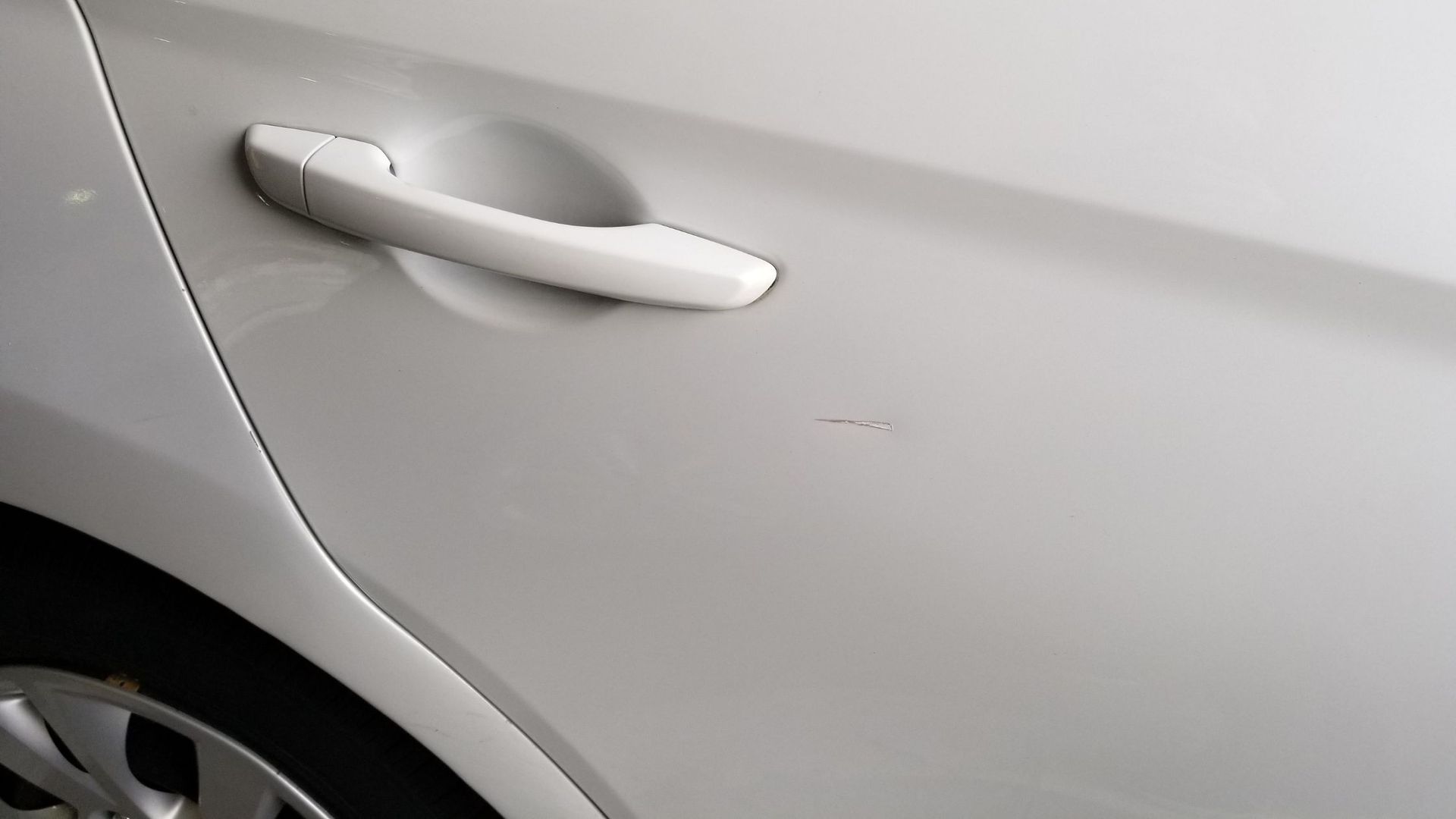 Restoring Your Car's Beauty: Can a Door Ding Be Pulled Out Successfully?