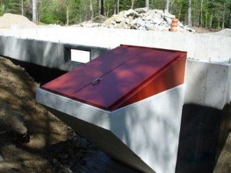 Precast Bulkhead Against Block Wall