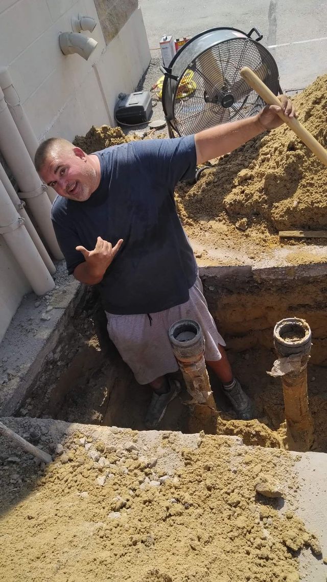 Man Cleaning Sewer